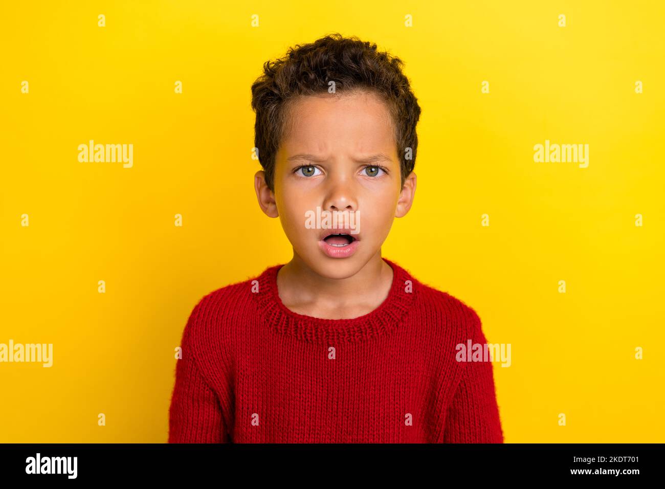 Photo portrait of charming little pupil boy look confused open mouth ...