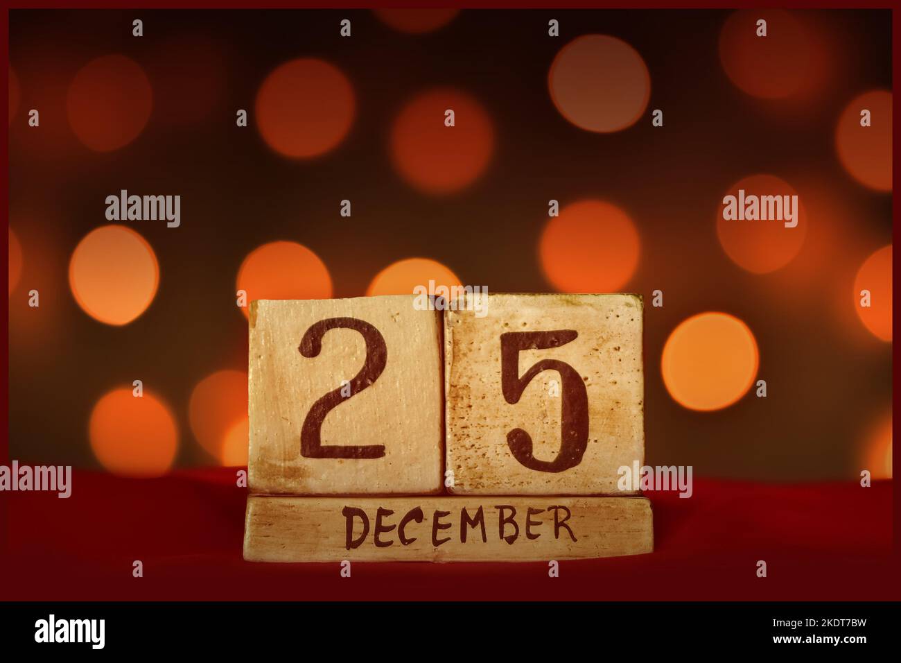Christmas december 25 vintage wooden block calendar on red fabric ...