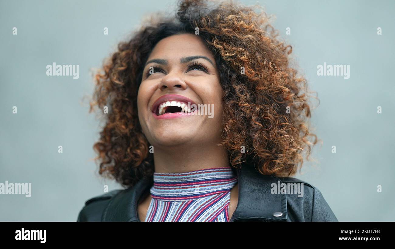 Carefree black woman portrait smiling feeling free Stock Photo - Alamy