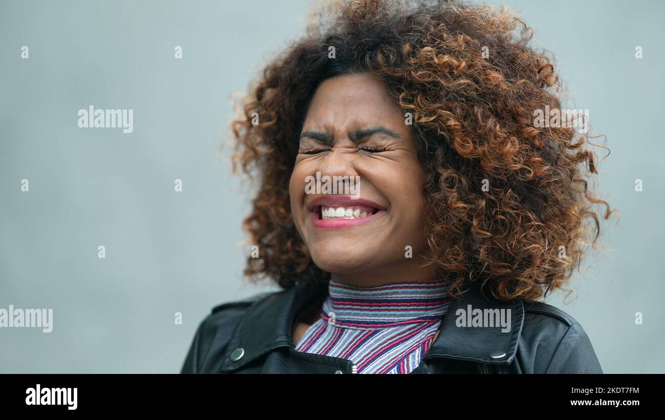 Carefree black woman portrait smiling feeling free Stock Photo - Alamy