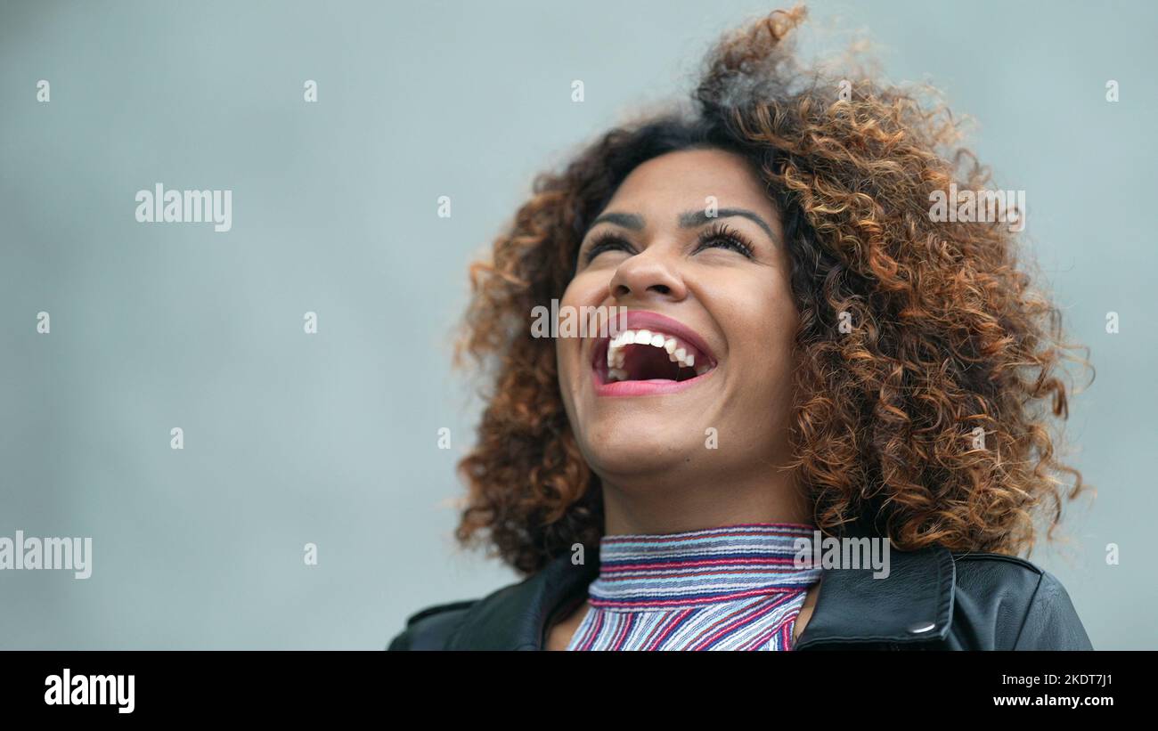 Carefree black woman portrait smiling feeling free Stock Photo - Alamy