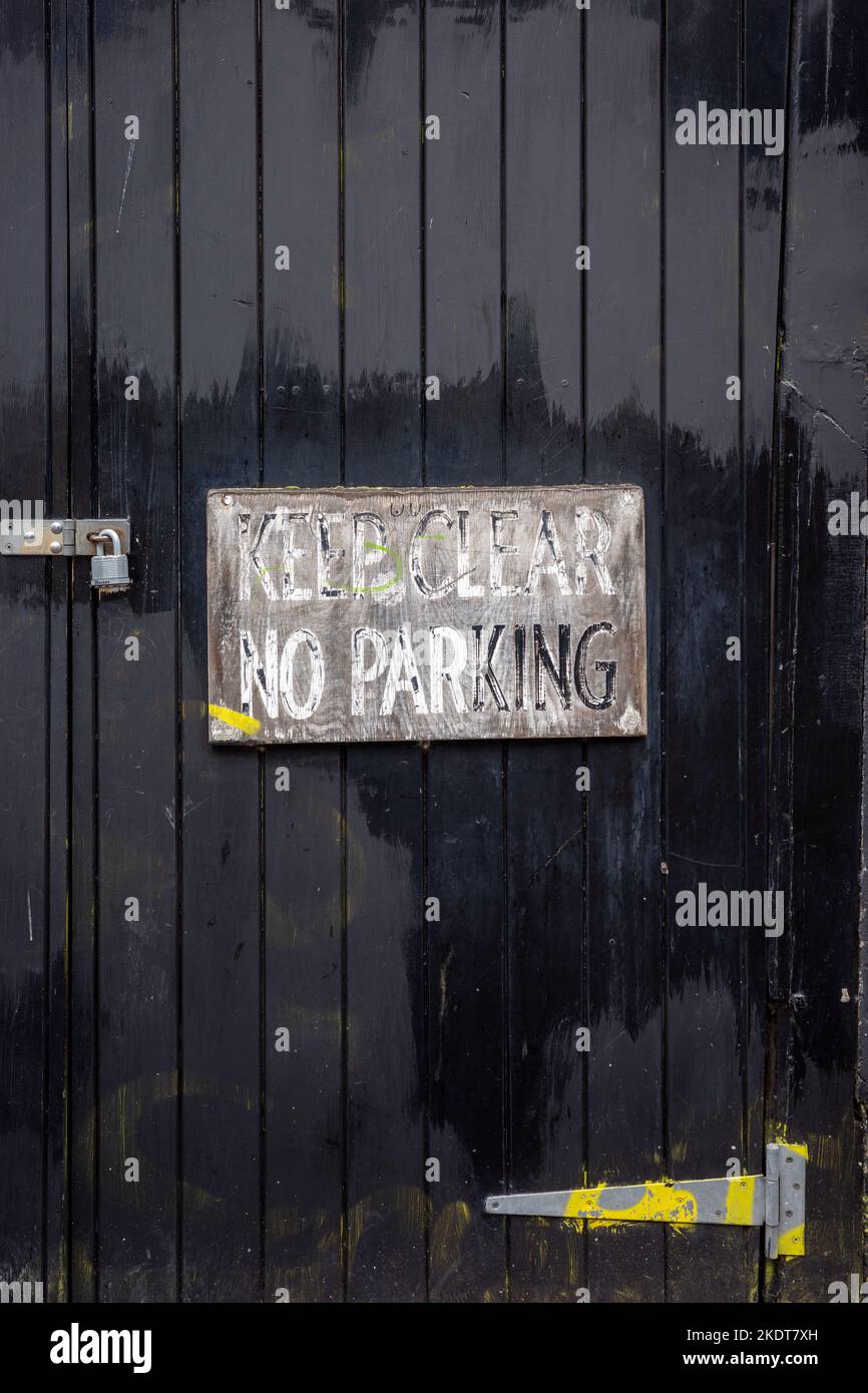 Peeling paint no parking sign Stock Photo - Alamy