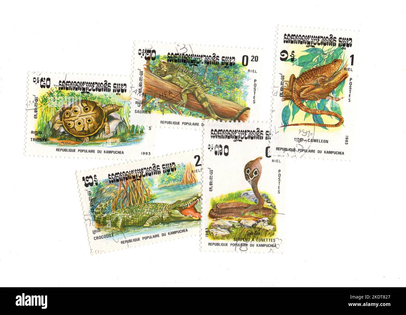 A montage of vintage postage stamps from Kampuchea (Cambodia) on a ...