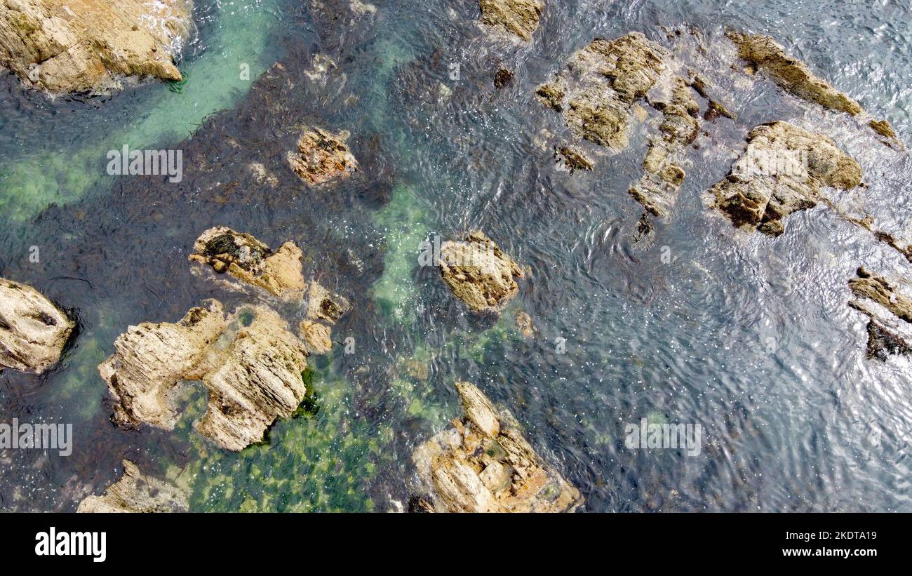 Drone photo. A lot of boulders in the sea water, top view. Coastal ...