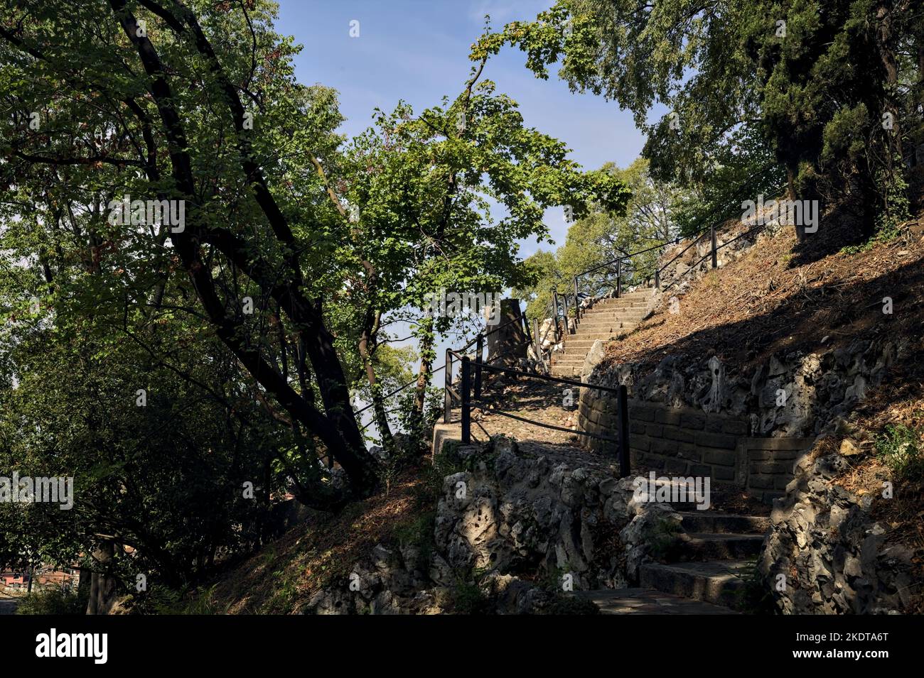 Stone staircase by the edge of a slope in a park Stock Photo - Alamy