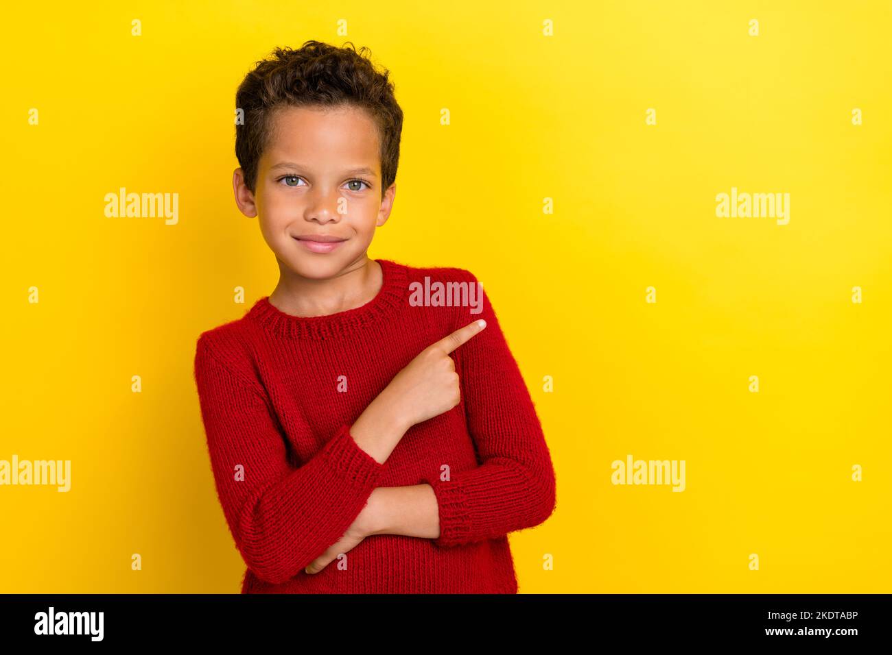 Photo portrait of cute little pupil boy point empty space promo banner ...