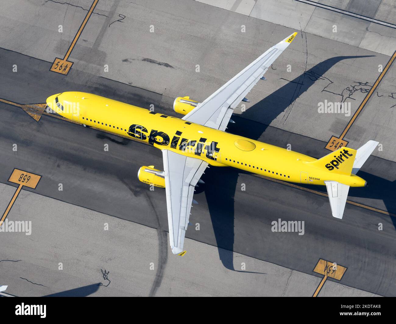 Spirit Airlines Airbus A321 airplane. Aircraft in yellow livery of low ...