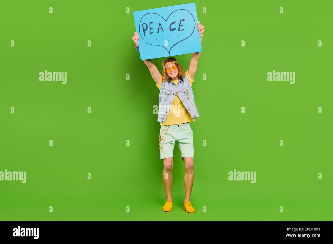 Full length body size view of attractive cheerful guy holding peace ...