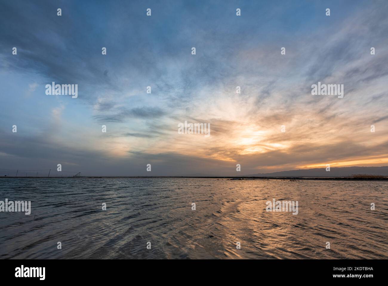 Qinghai mountain cliff jade lake sunset Stock Photo - Alamy