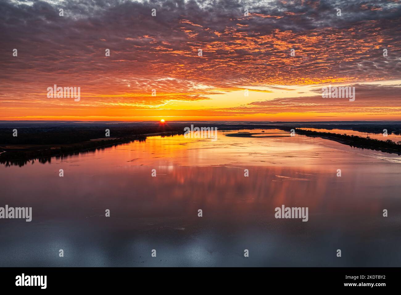 Sunrise over the Tennessee River with beautiful colorful orange sky ...