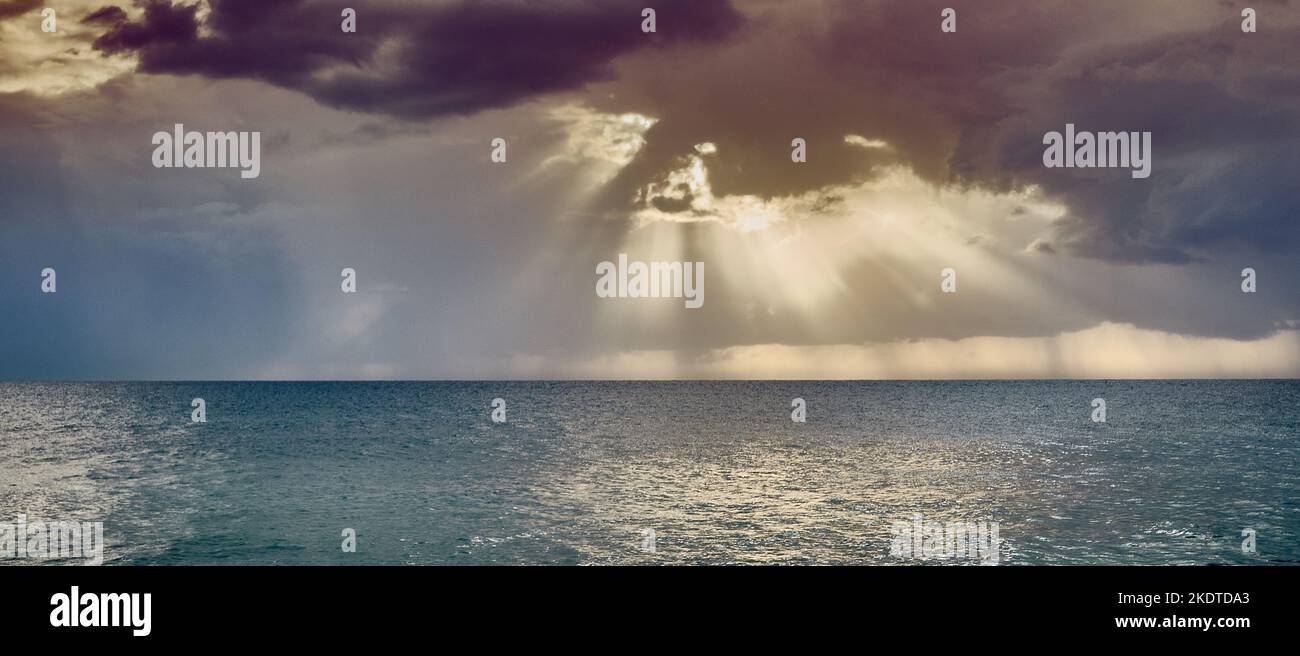 The sea of Roman things and the sun through the clouds Stock Photo - Alamy