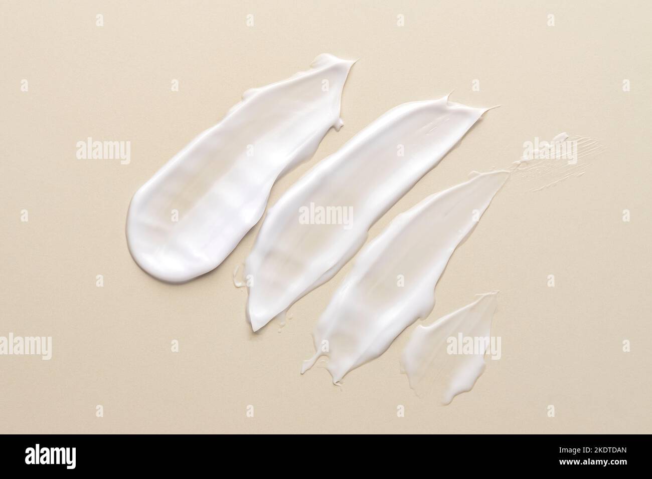 Skin care cream, face serum, lotion swatch smear on beige background ...