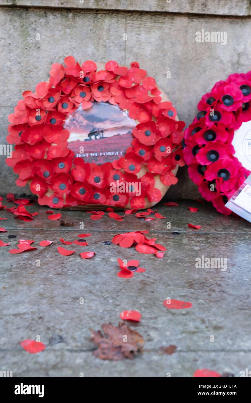 Remembrance Day poppy wreaths laid on the steps of the war memorial in ...