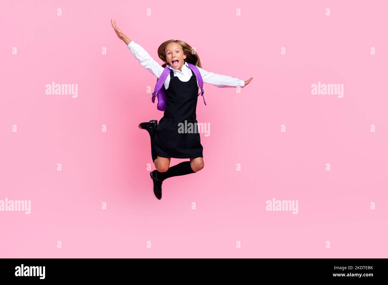 Full size photo of nice smart schoolgirl with flattering hairdo dressed ...