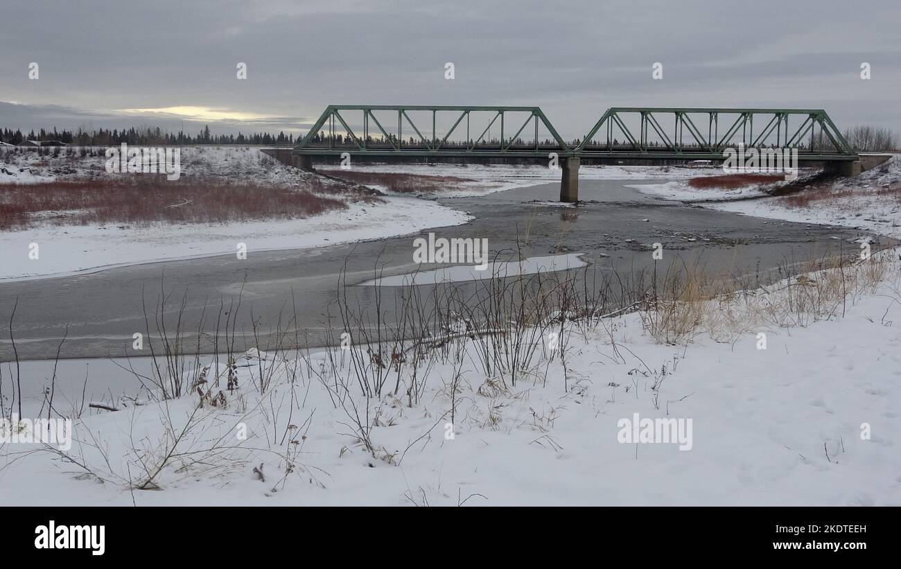 The bridge across the West Channel of the Hay River, which flooded in ...