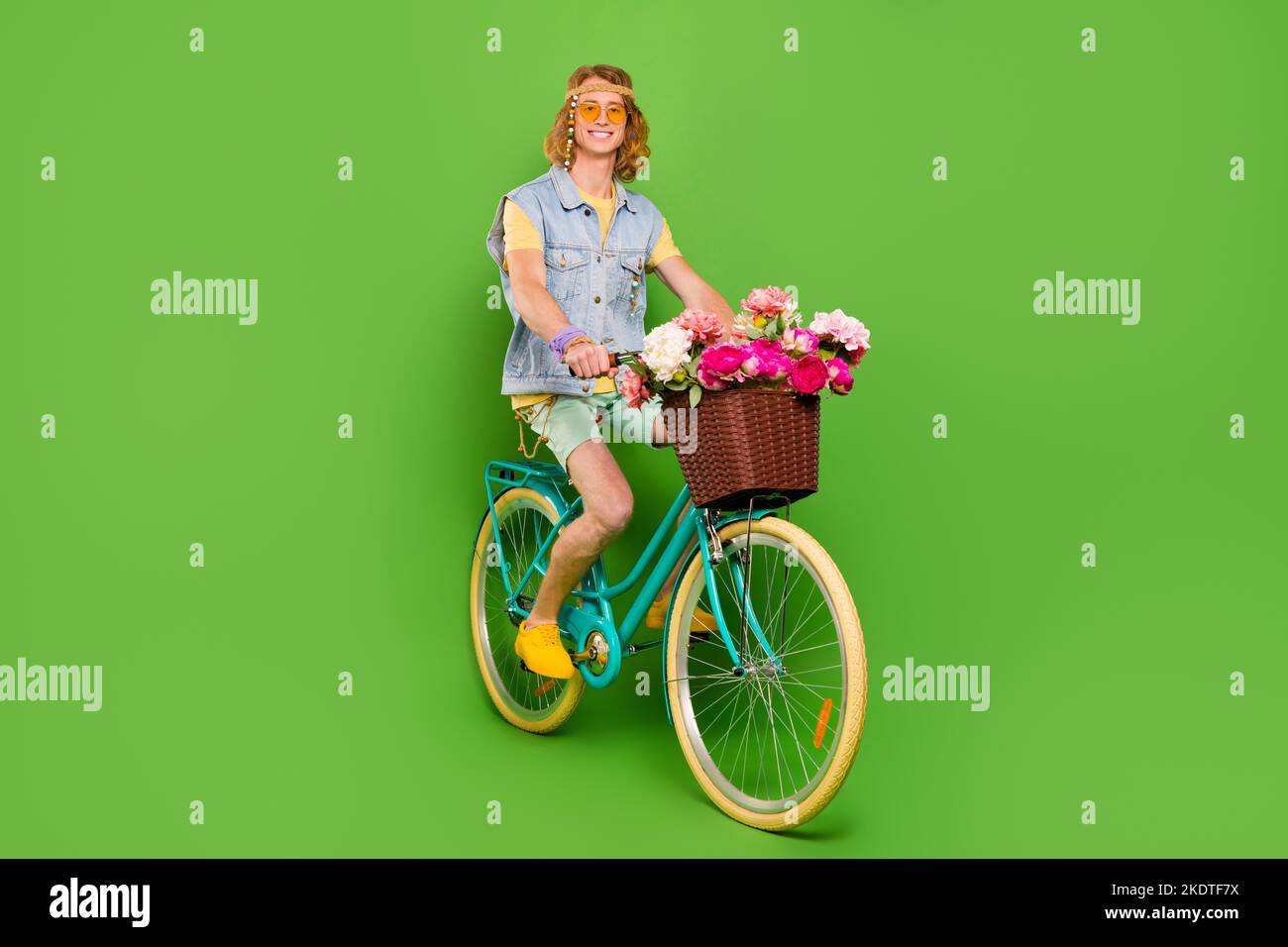 Full length body size view of attractive cheerful guy riding bicycle ...
