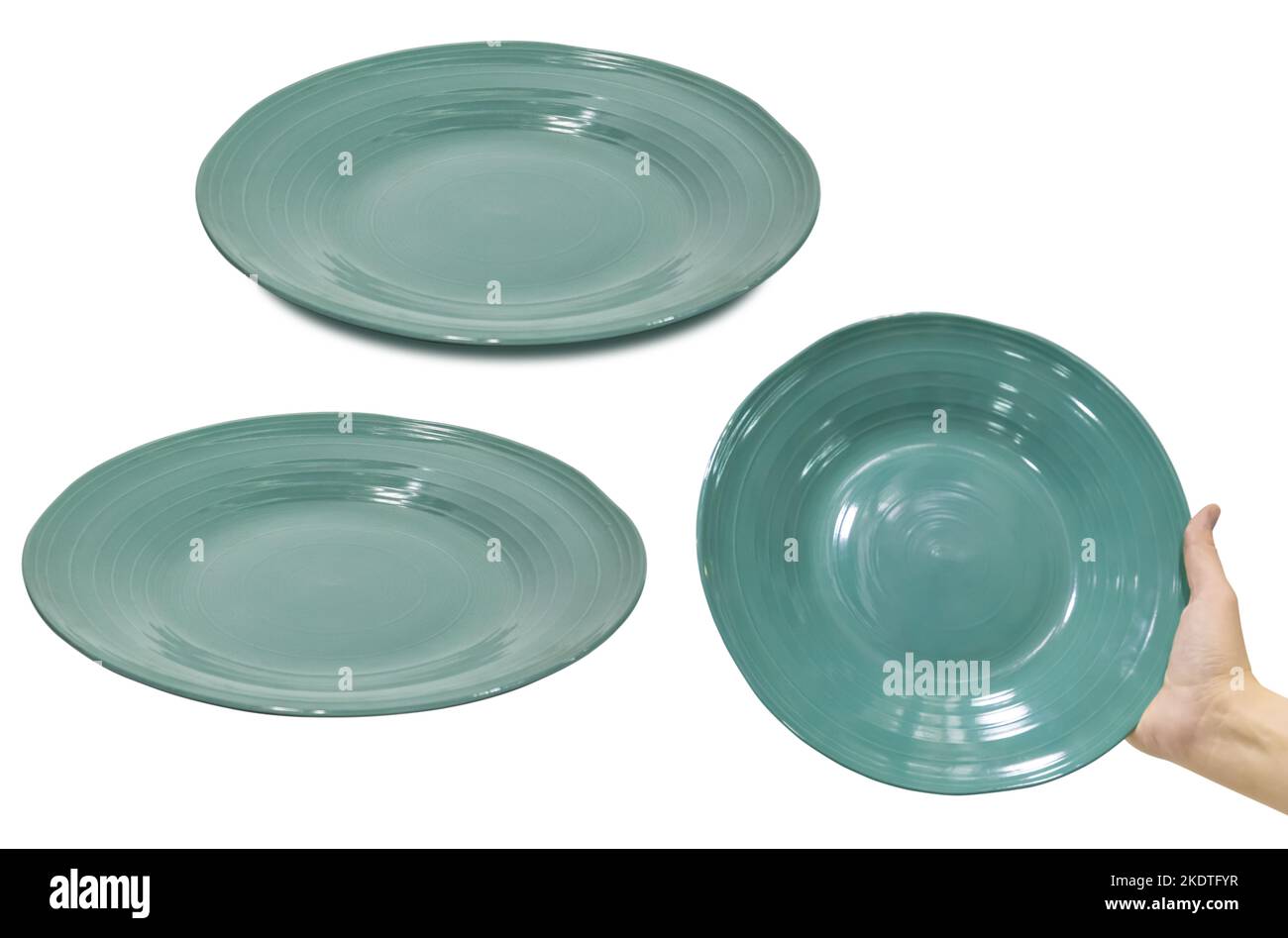 Empty ceramic plate in hand. Isolated from the background Stock Photo ...