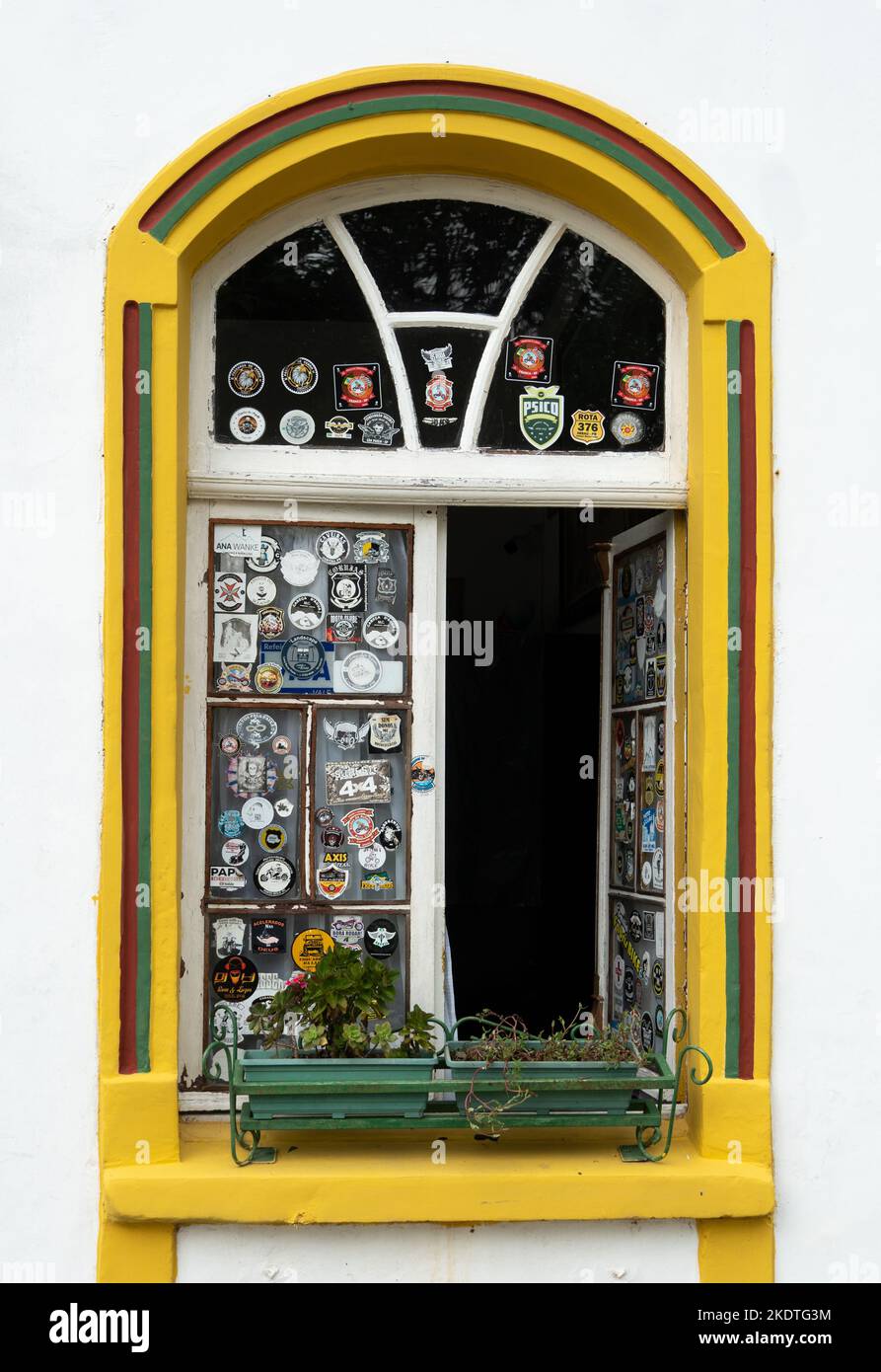 Yellow window of an old house Stock Photo - Alamy