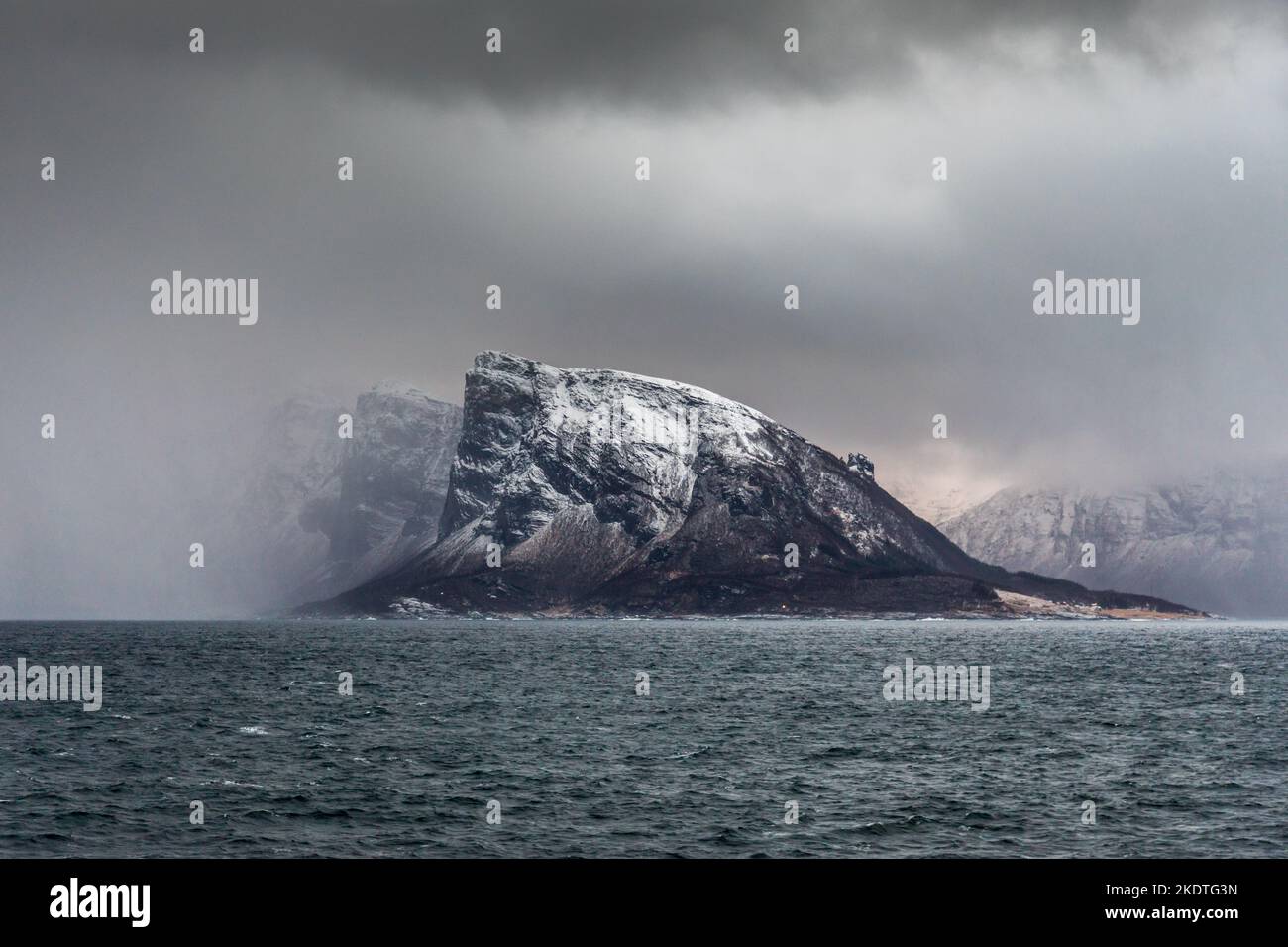 Storm clouds and wintry weather over the impressive Norway fjord ...