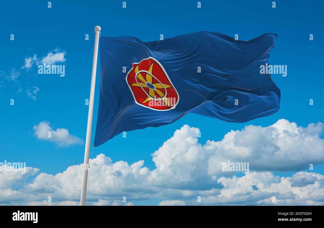 flag of Baltic Finns Kven people at cloudy sky background, panoramic ...