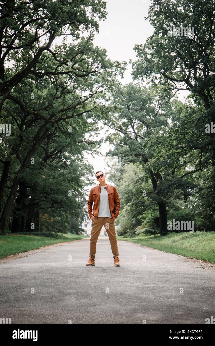 One person walking along a path into the mist hi-res stock photography ...