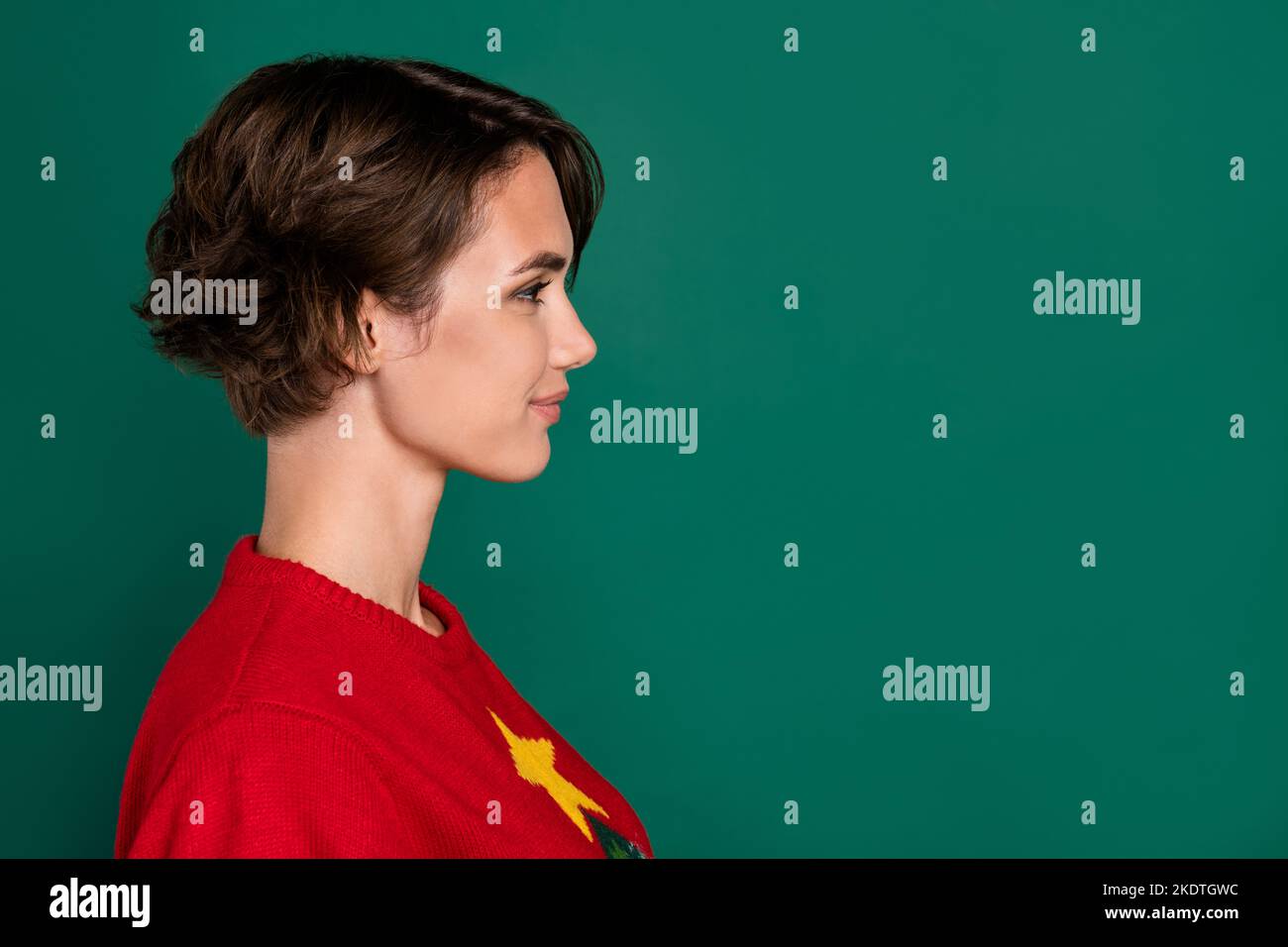 Photo of sweet charming lady wear red sweater looking empty space ...