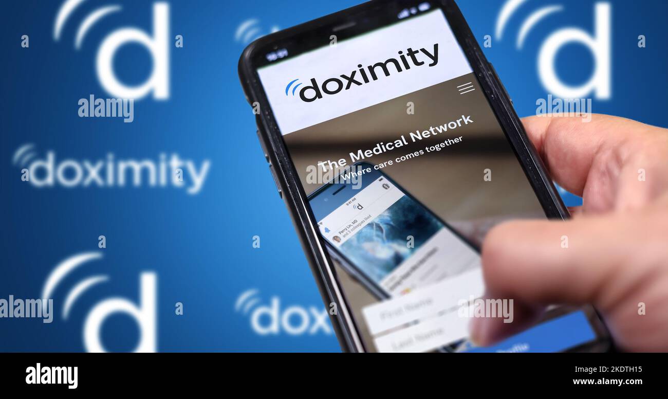 San Francisco, CA, USA March 2022: Doximity company website on a phone screen. Blue background ...
