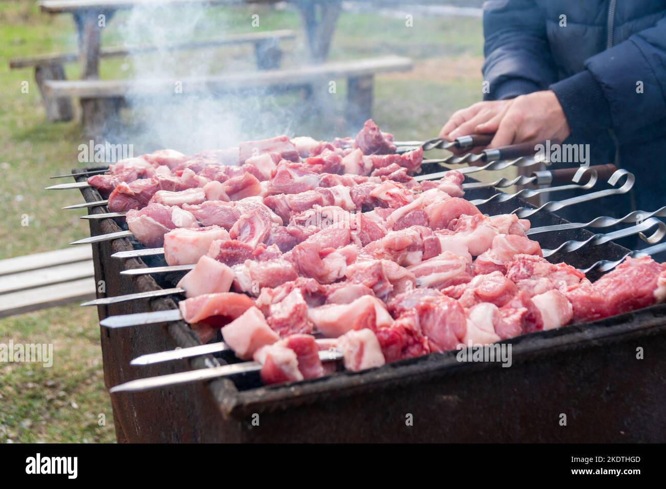 Georgian mtsvadi, Shashlik preparation. Smoking shashlik on the grill ...