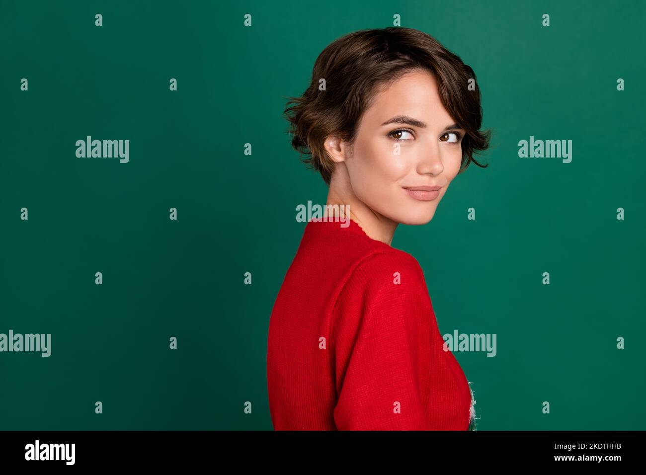 Photo of sweet shiny girl dressed ugly print pullover looking back ...