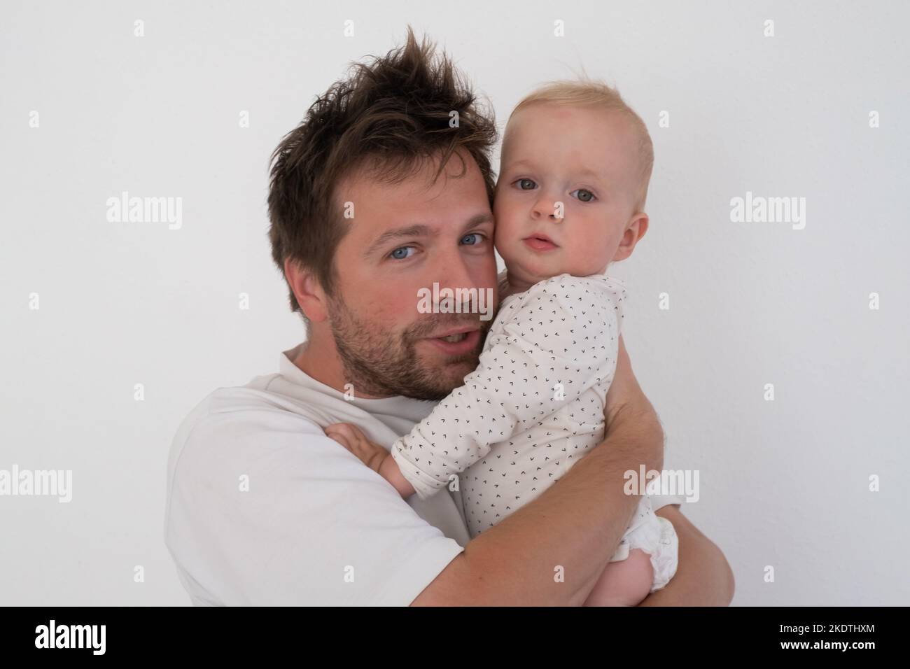 Father and daughter cuddling and bonding spending time together Stock ...