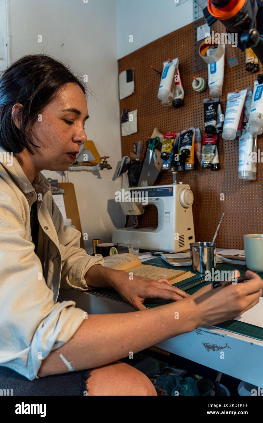 studio or work space of a hispanic woman artist, oil painting, mexico ...