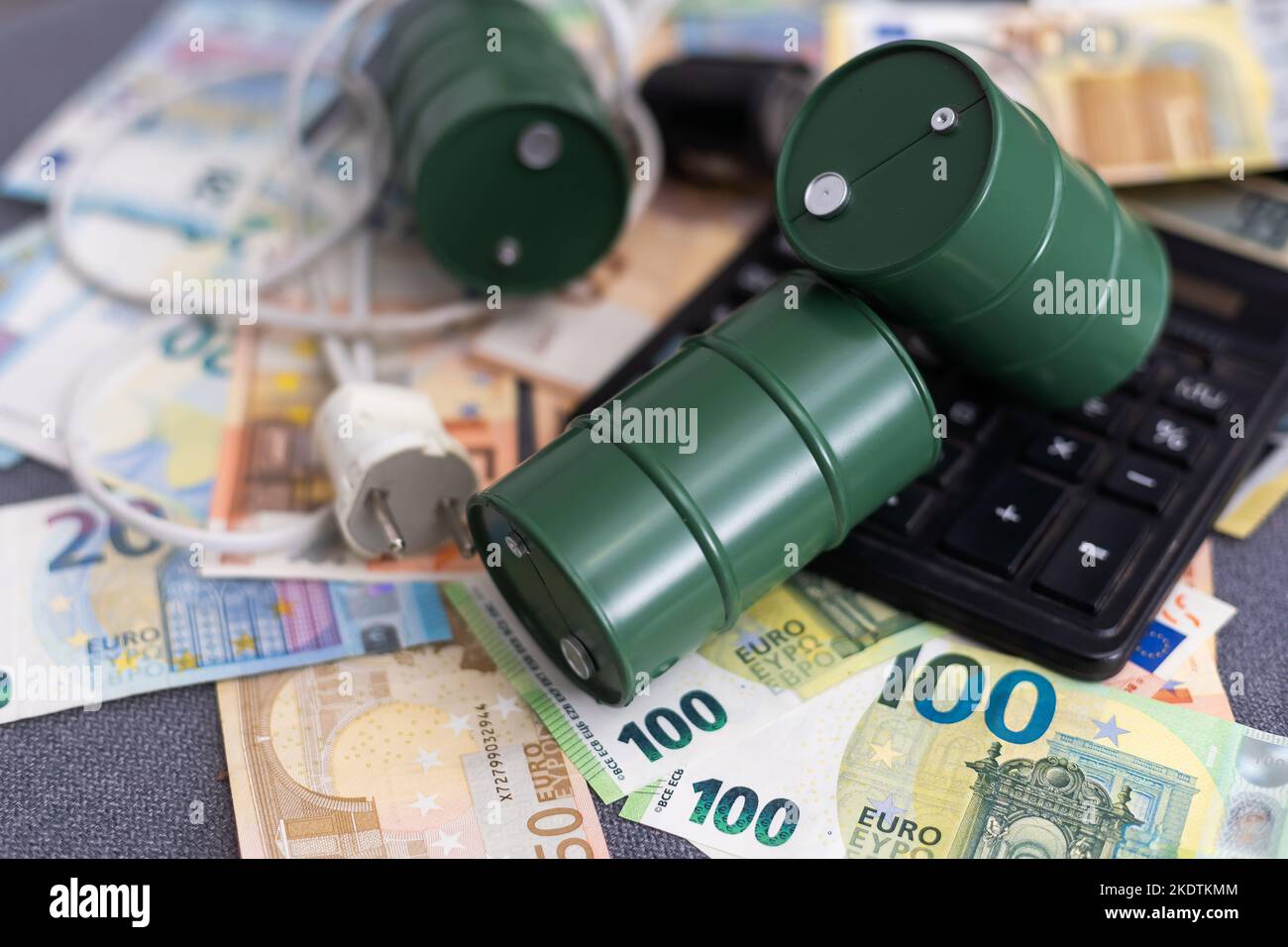 Three barrels of oil surrounded by money. Oil production. Black gold ...