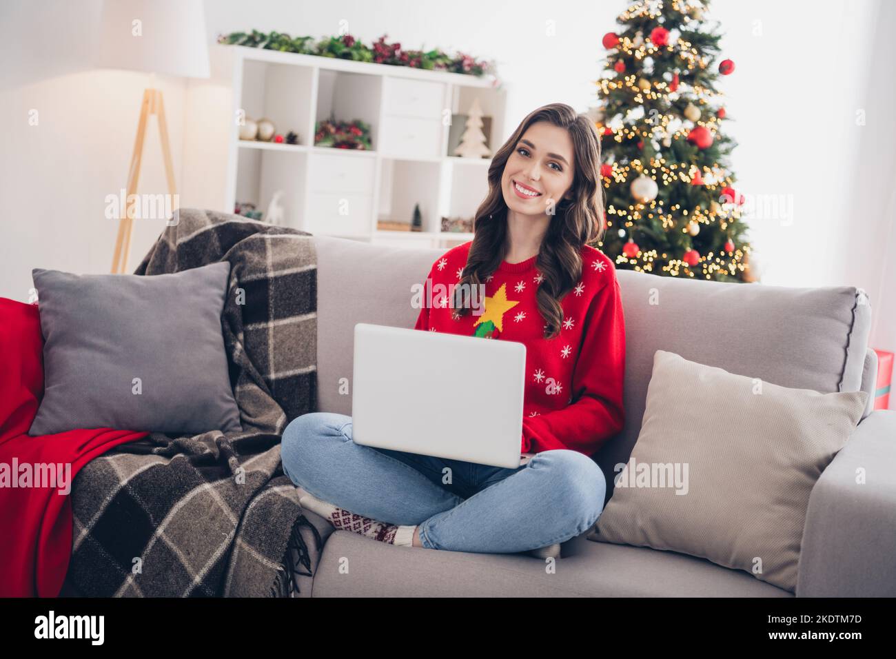 Photo of relaxed cute positive lady home working remote computer choose ...