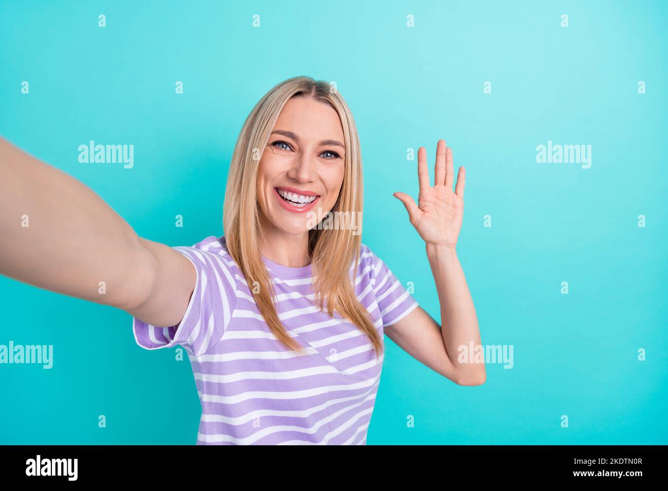 Photo of good mood pretty girl straight hairdo dressed striped t-shirt ...
