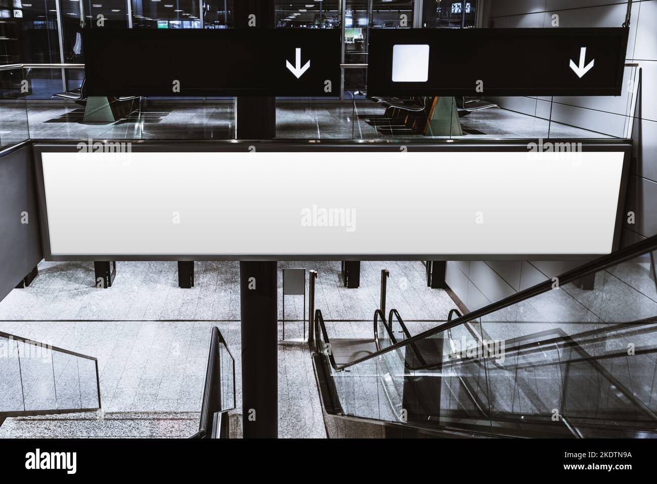 A mock-up placeholder of a blank indoor billboard over the stairs and ...