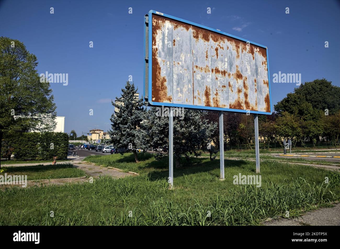Empty and rusty billboard by the edge of a road in the italian ...