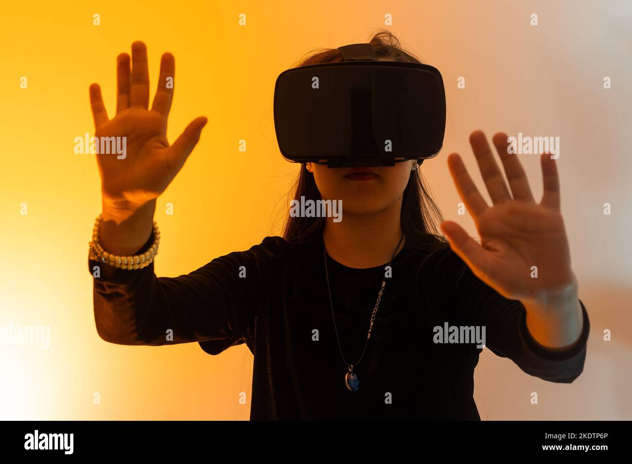 amazed teen girl wear vr glasses using technology for education in ...