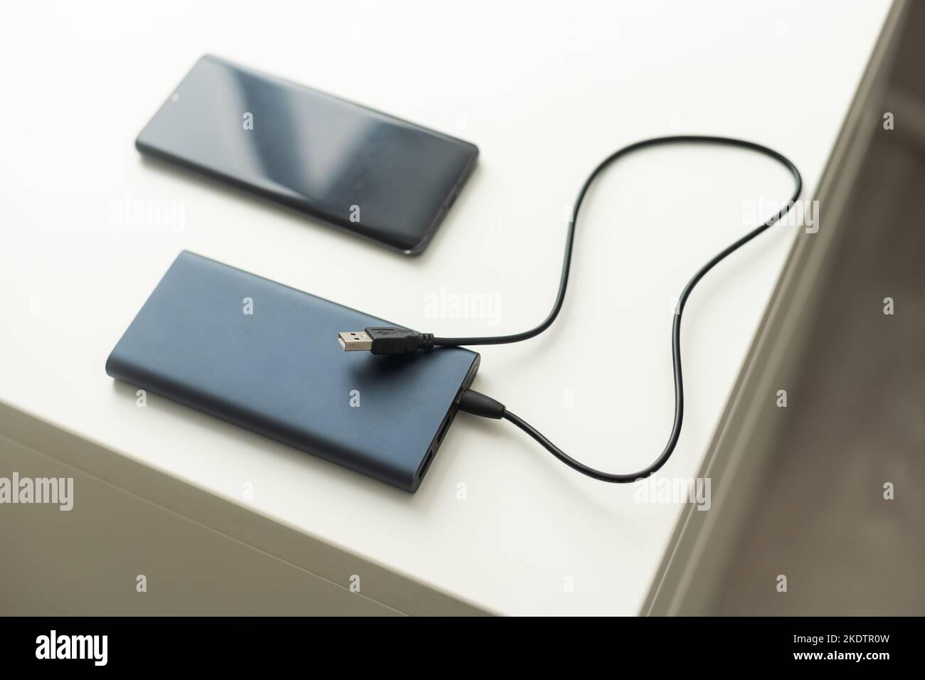 Power bank for charging mobile devices. Smartphone charger. External ...