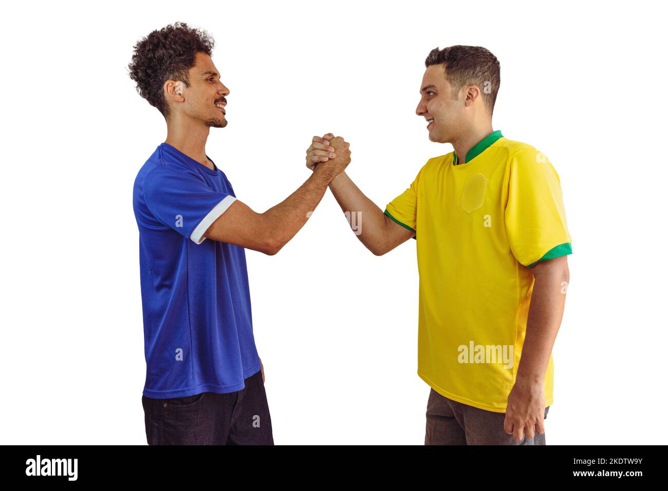 Young male black soccer competitors standing against white background ...