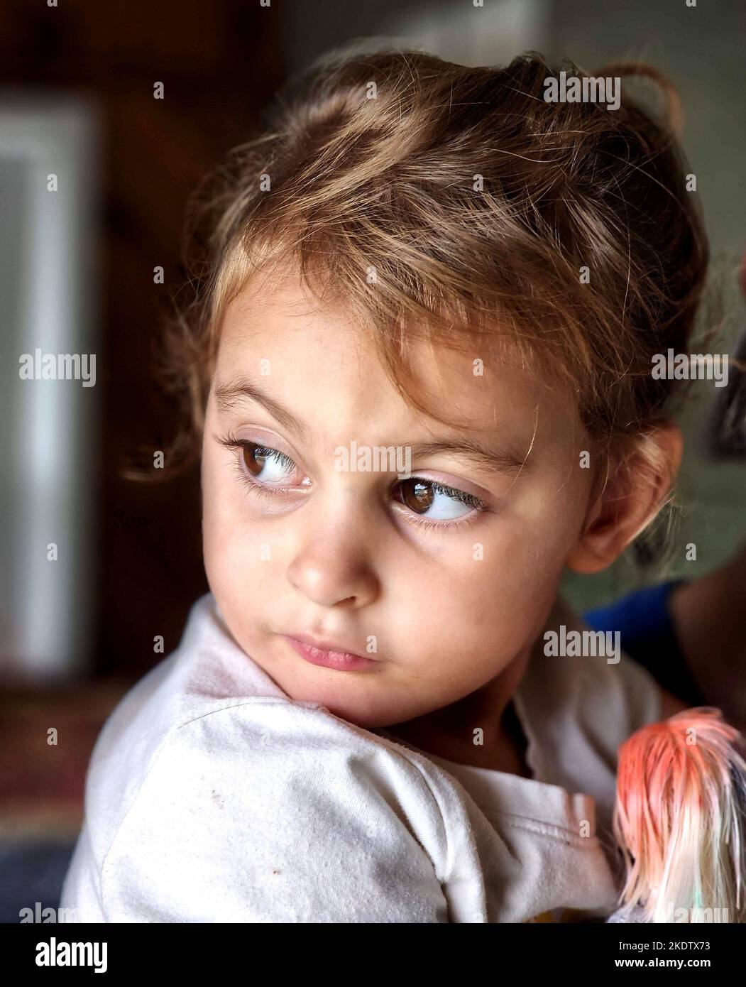 Color Portrait of a little girl staring at something Stock Photo - Alamy