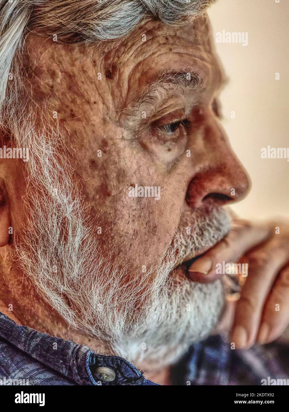 Side photo of an elderly man's face Stock Photo - Alamy