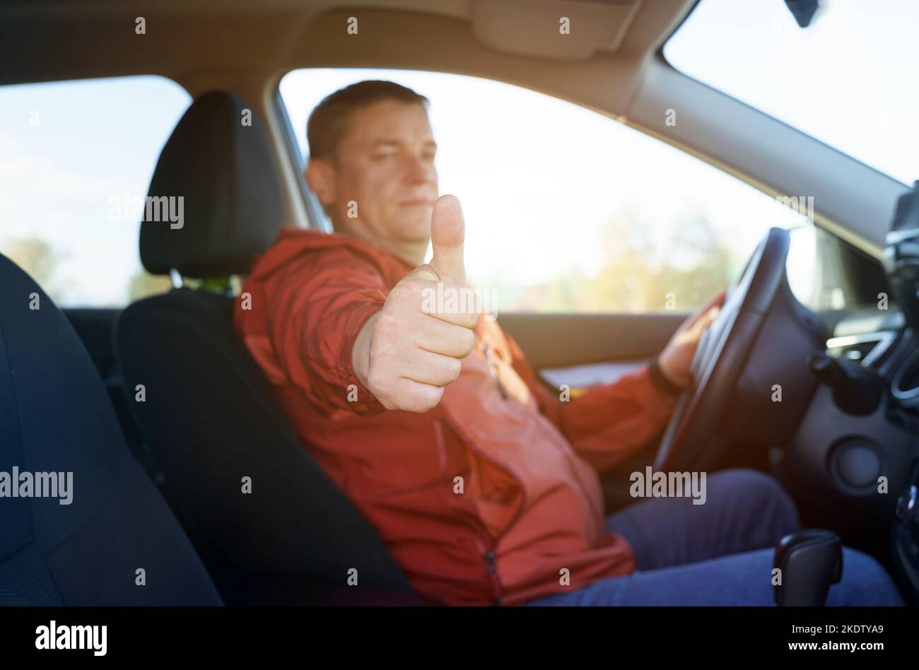 The driver shows a class gesture with his hand. Gesture class in ...