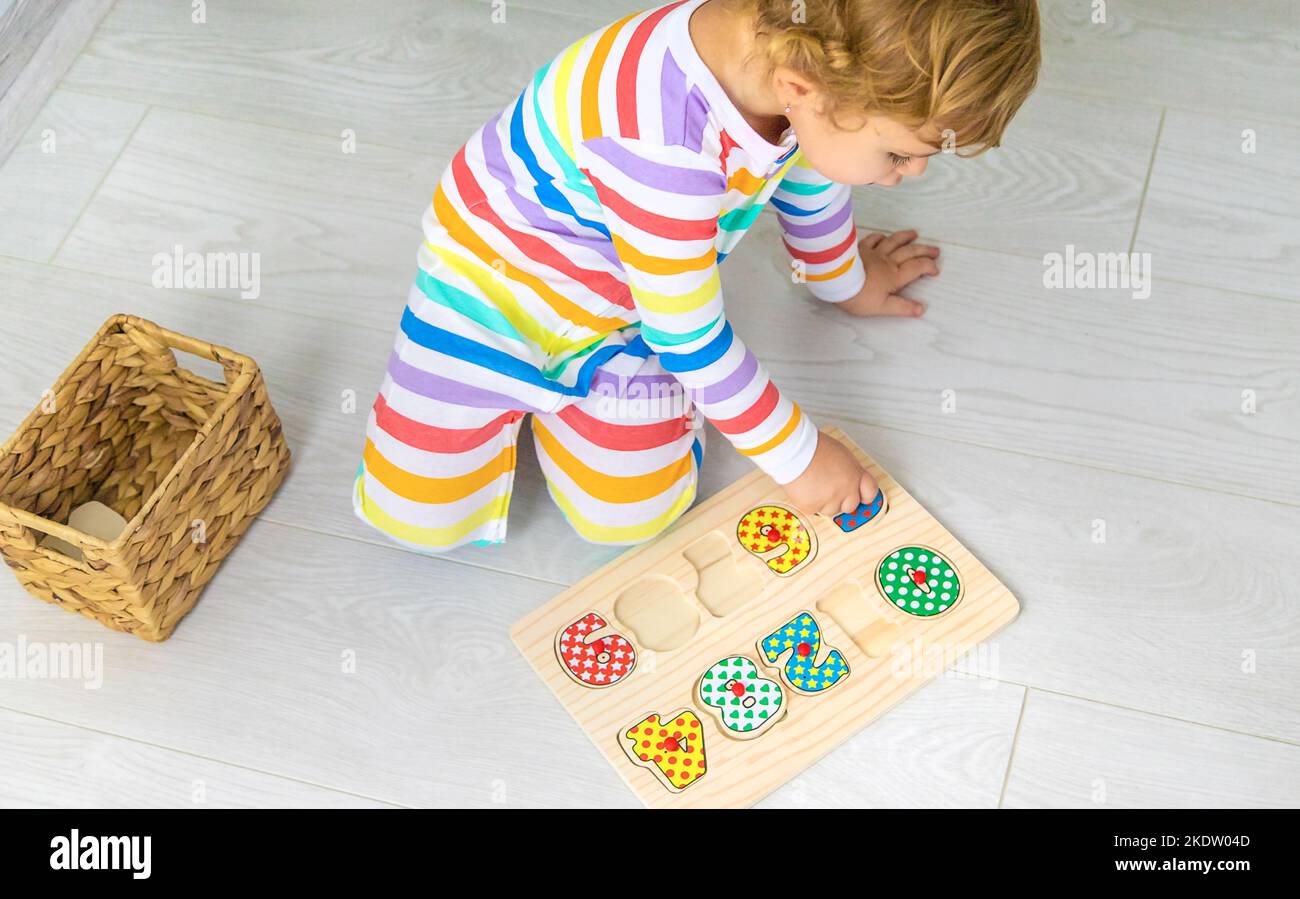Child learns numbers game logic. Selective focus. Baby Stock Photo - Alamy