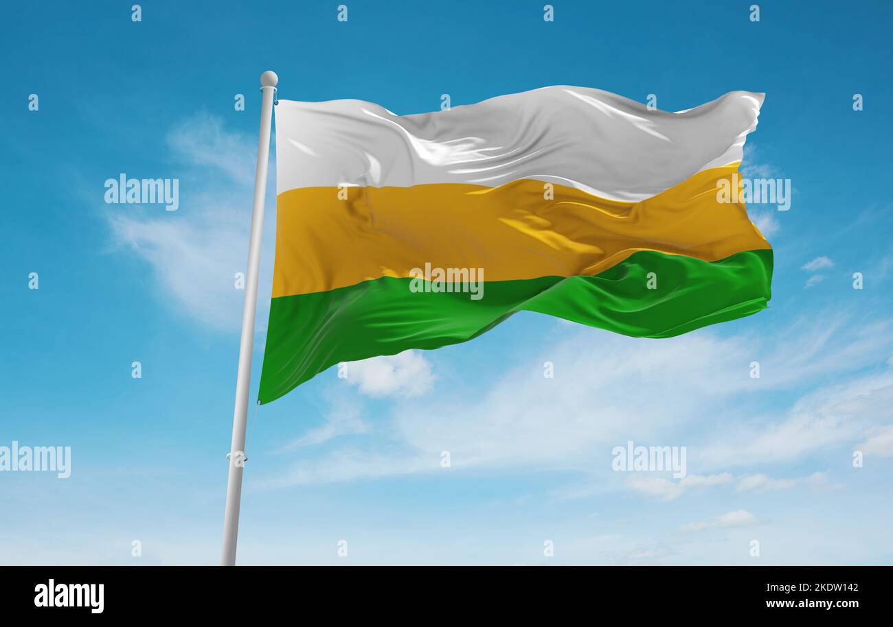 official flag of Guayanilla untied states of America at cloudy sky ...