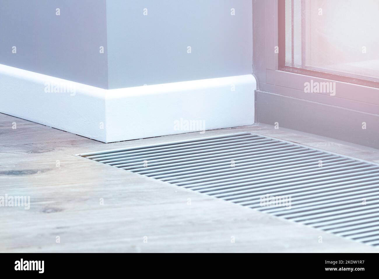 the convector heats the room, next to the window. The concept of ...