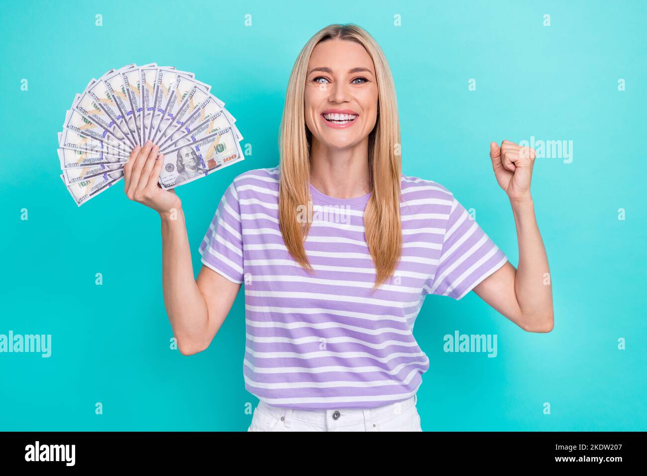 Closeup photo of beautiful lady hands fists up hold bucks money look ...