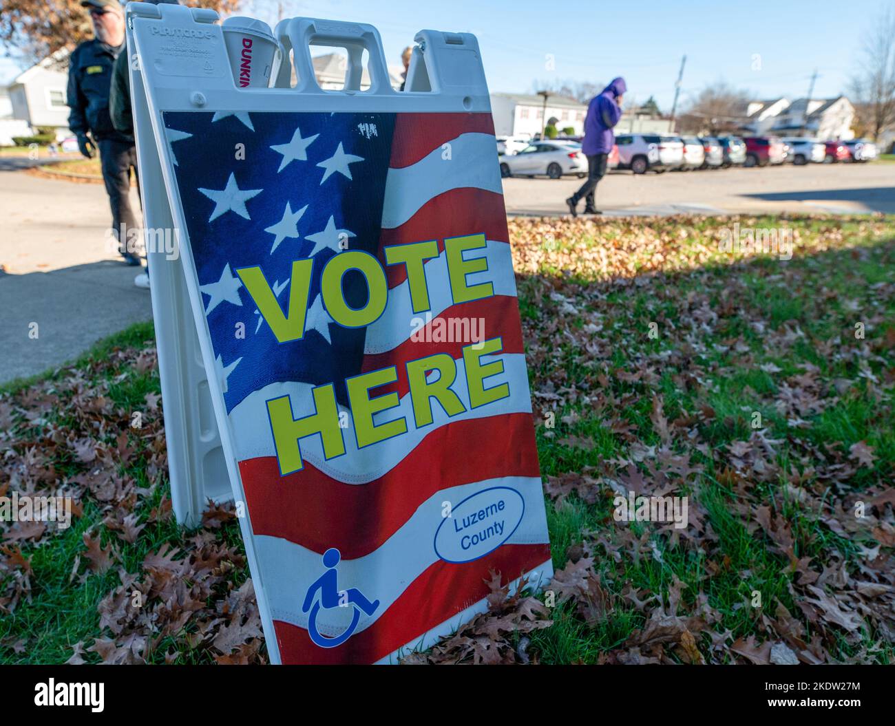 A vote here sign outside of a polling place. (Photo by Aimee Dilger ...