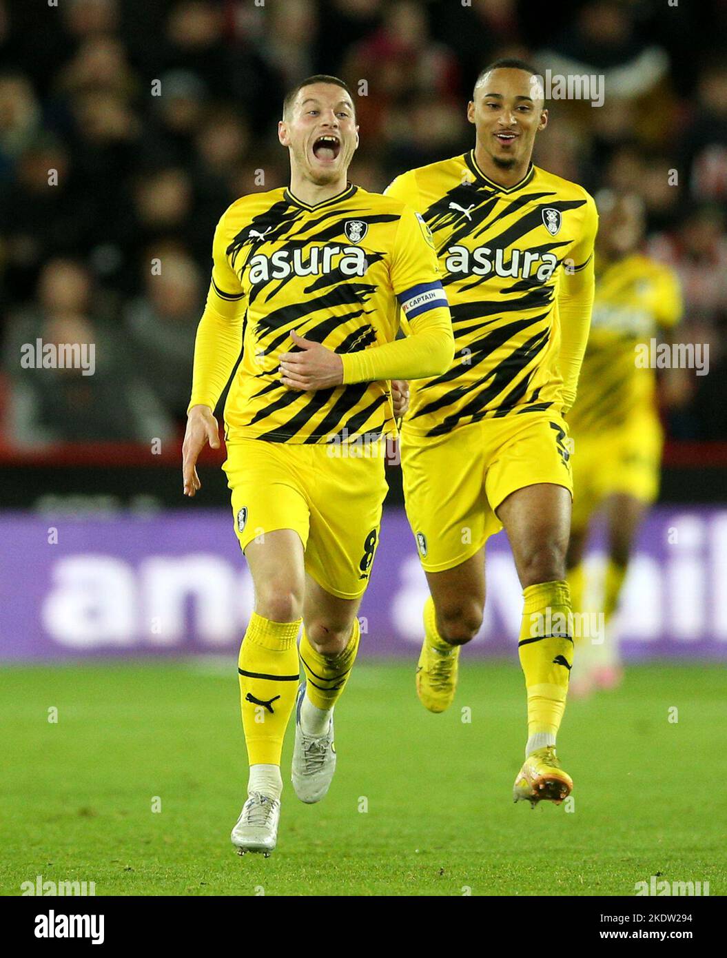 Rotherham United's Ben Wiles (left) celebrates with Cohen Bramall after ...