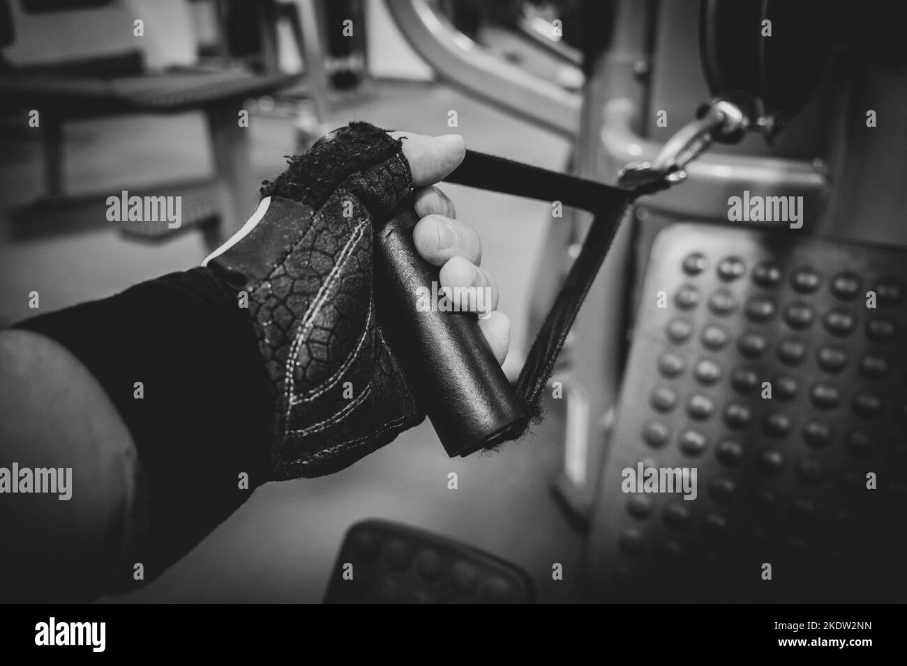 one hand pulls a pulley at the gym Stock Photo - Alamy