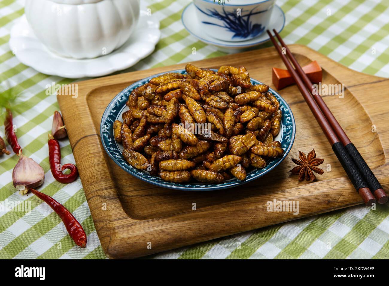 Deep fried silkworm hi-res stock photography and images - Alamy